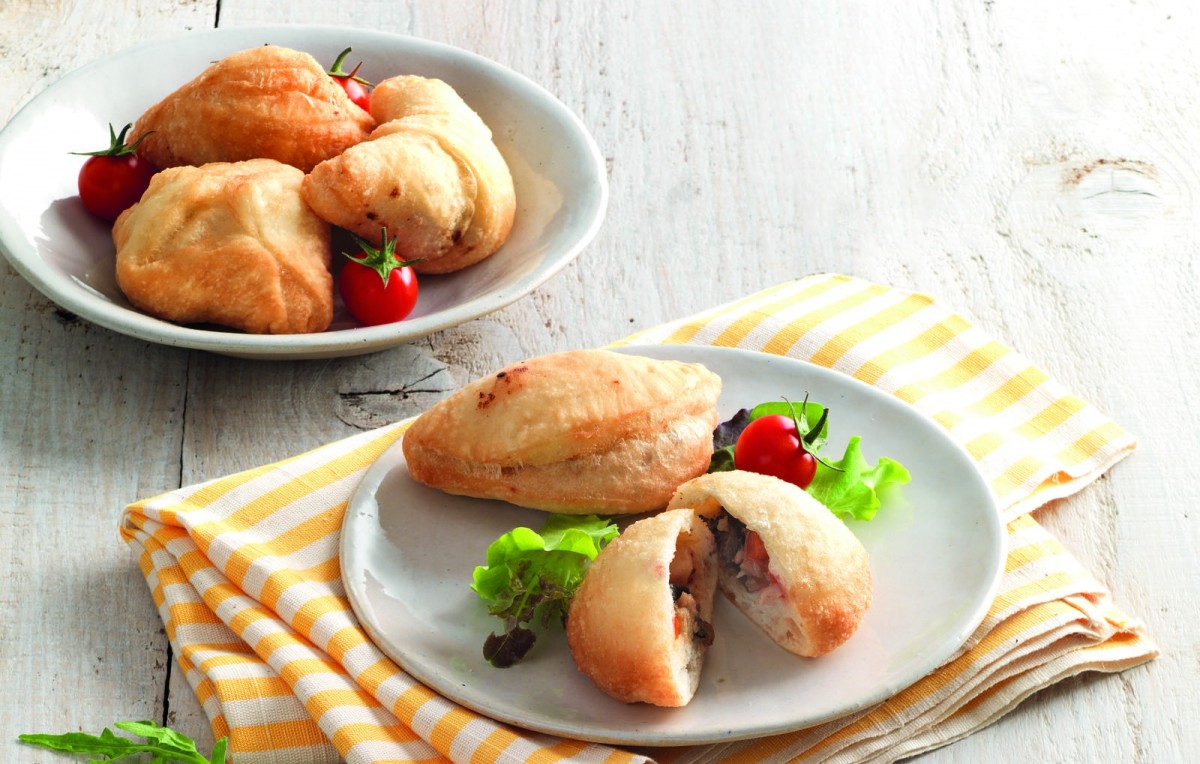 Panzerotti with Pepper, Eggplant, and Olives Recipe - La Cucina Italiana